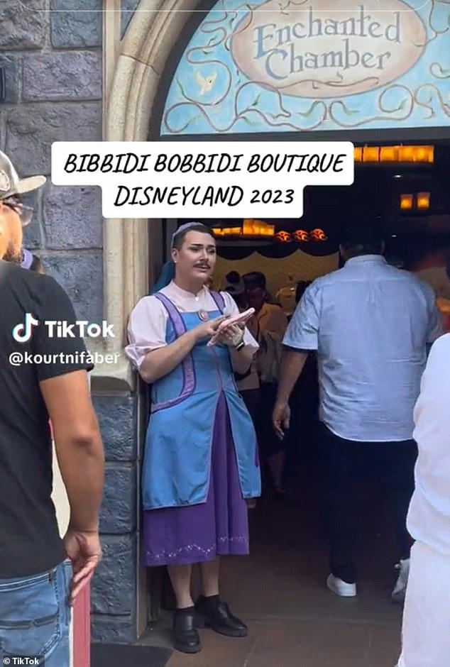 Moustached male Disneyland employee dressed as 'Fairy Godmother's ...